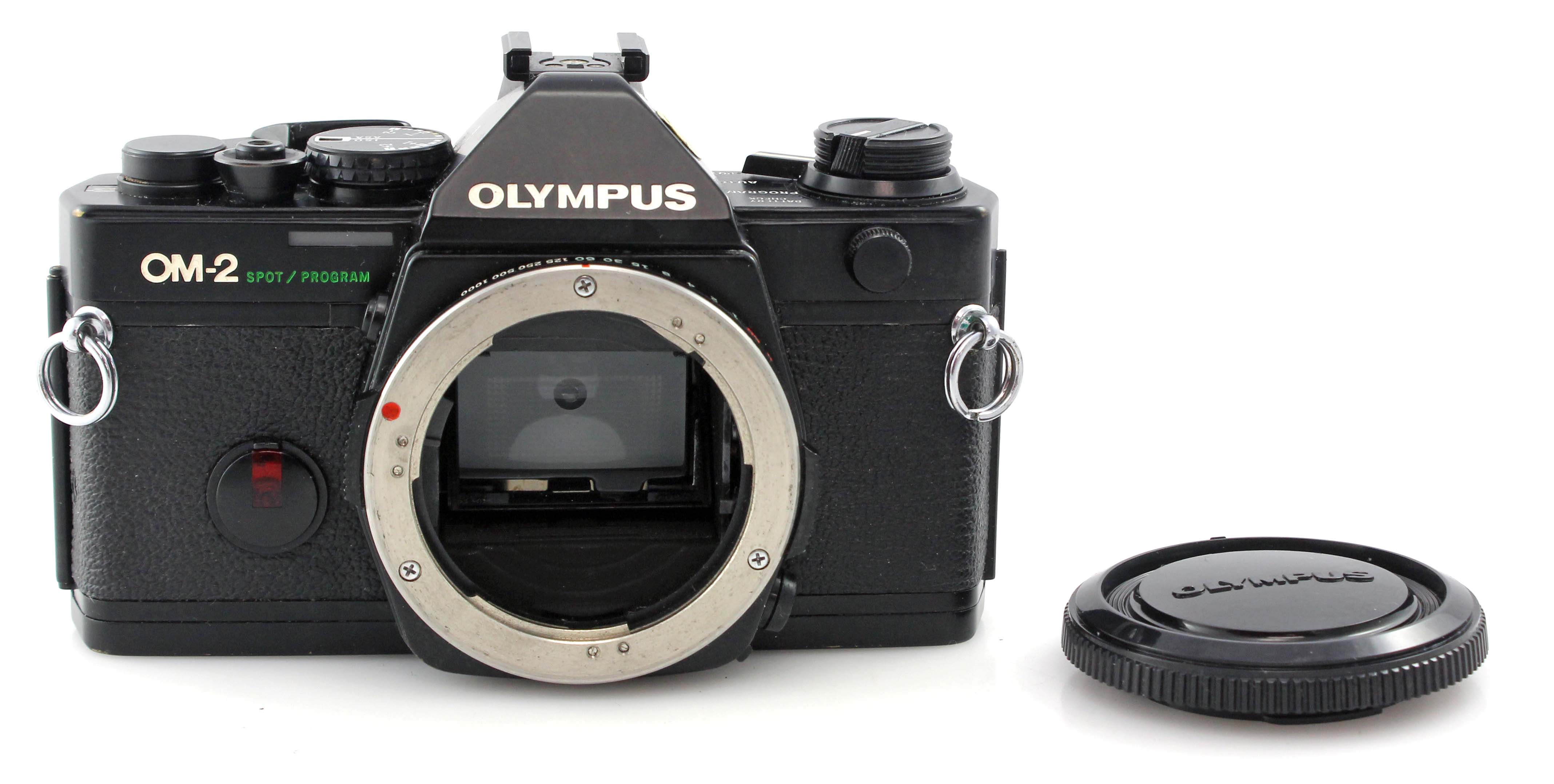 Olympus OM-2 spot / program 35mm SLR Body- Black – The Real Camera Company